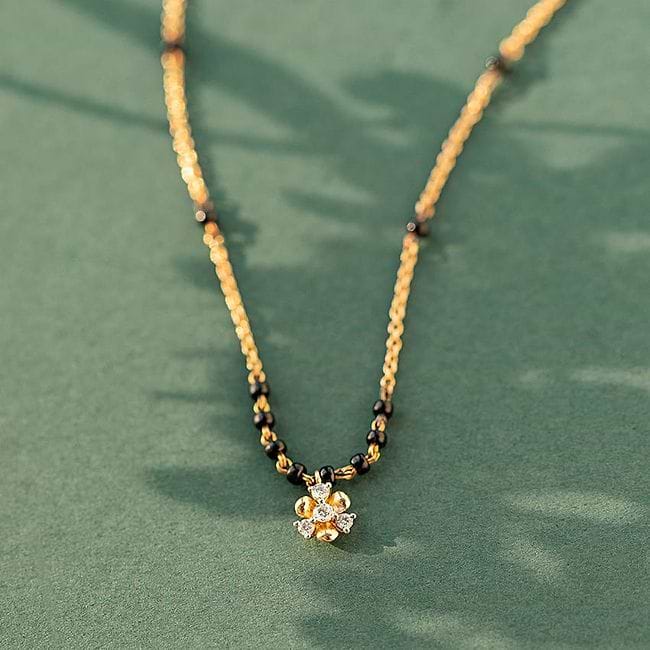 Caratlane black beads chain store