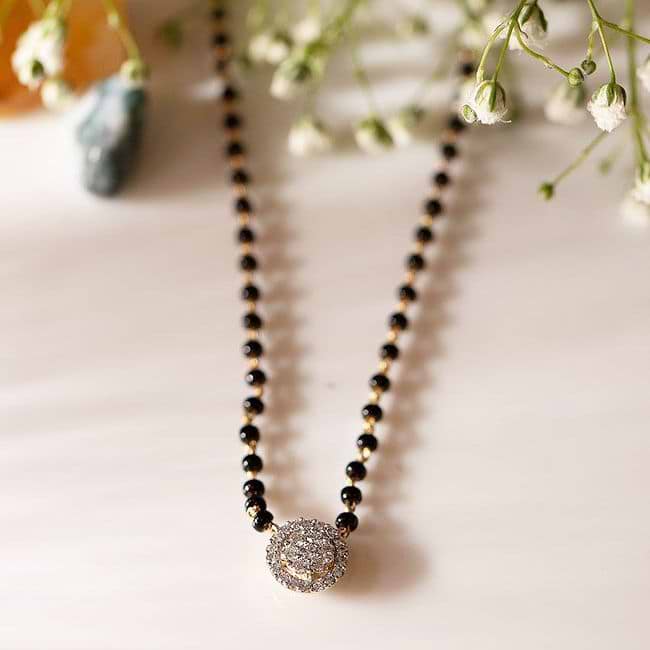 Caratlane black beads chain store
